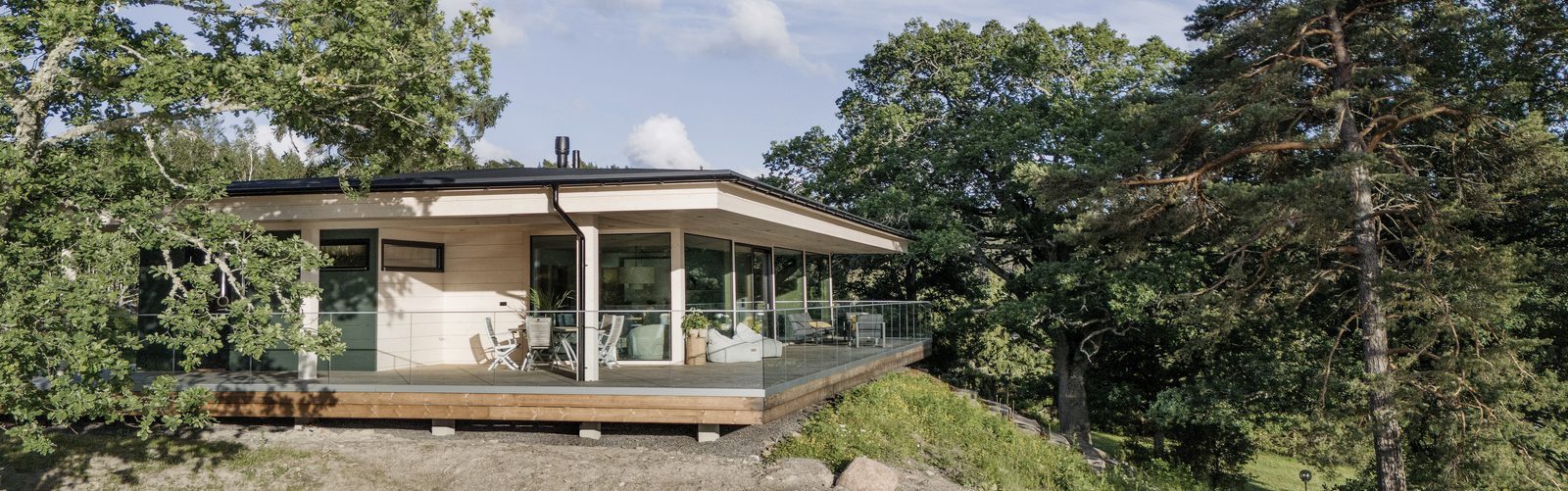 Tyylikäs Honka Lux -hirsitalo – sisustussuunnittelijan unelmakoti - Honka